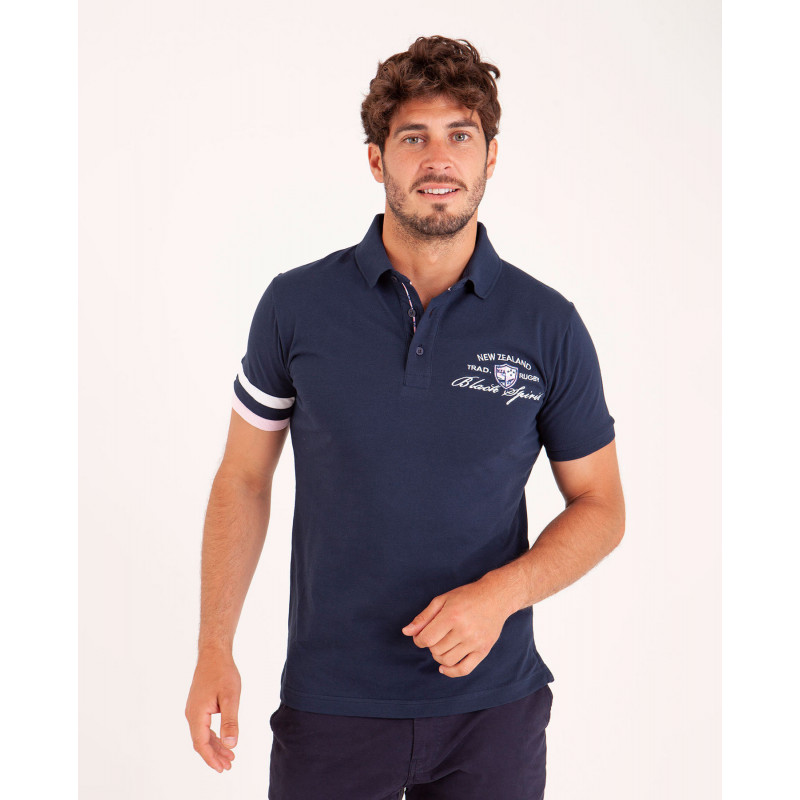Polo uni détails col et manche droite tricolore